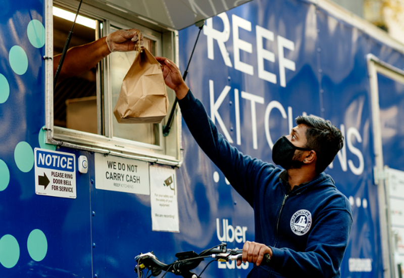 Ghost kitchens firm REEF buys into automated pizza concept
